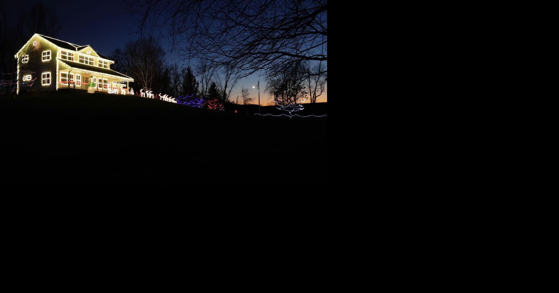 Down the lane and up the hill, the Voss home shines brighter each year ...