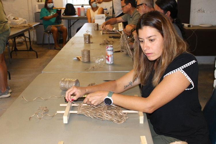 Cherokee National Treasure teaches class participants ancient art of ...