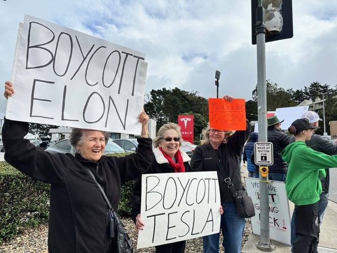 Local group protests at Tesla | News | coastsidenews.com