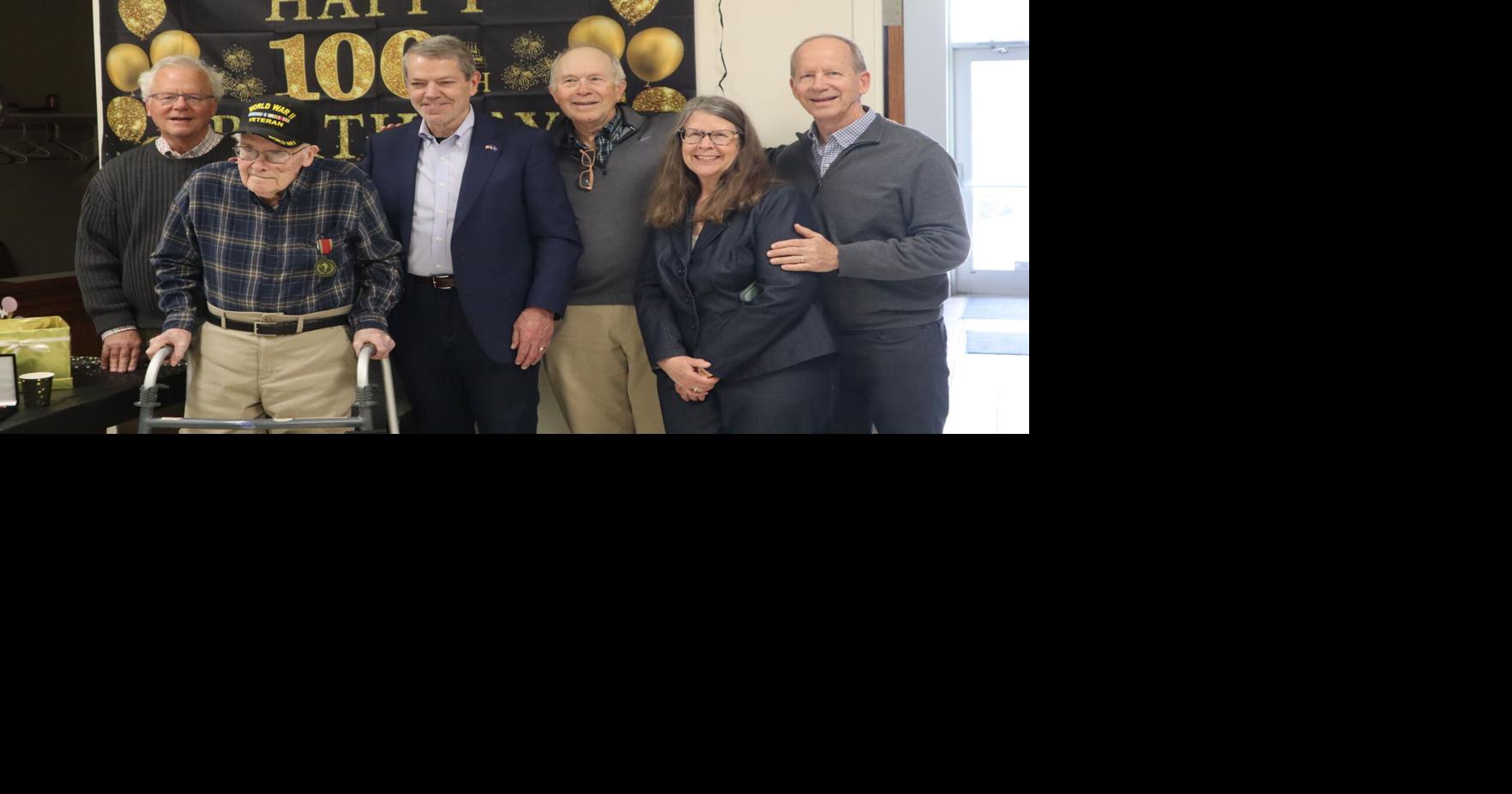 Wayne Davy,100, gets medal from Pillen for WWII service