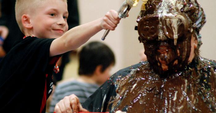 Centennial principal becomes 'human sundae'