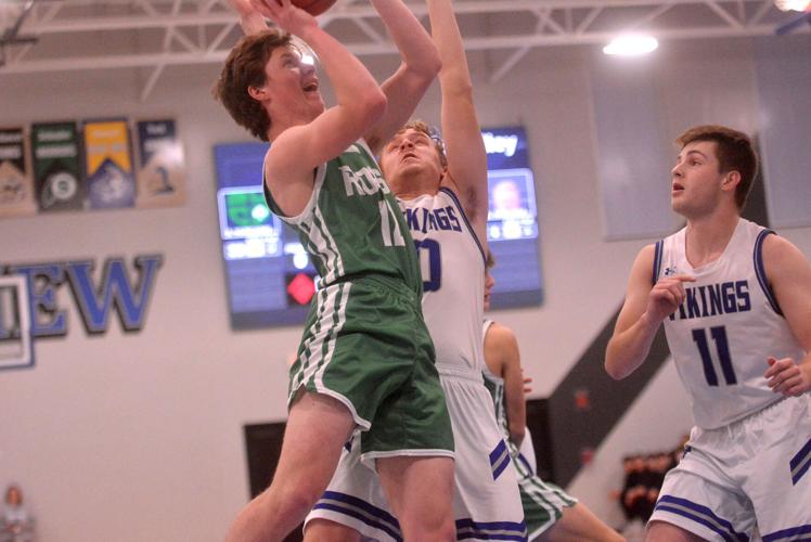 Late surge sends Vikes over 'Rocks