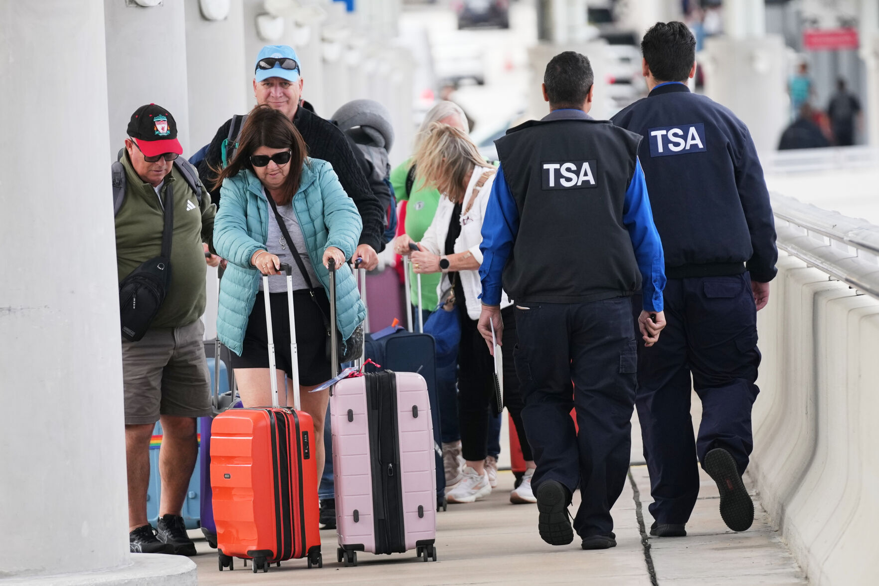 TSA agents work without pay due to another shutdown