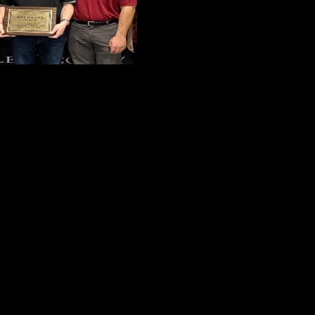 Hilger and Chmelka receive community service awards