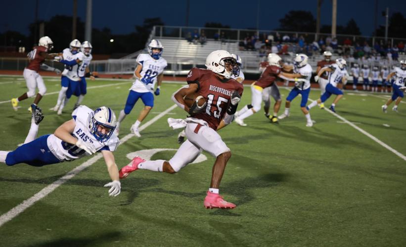 Spartans pull away late to defeat Discoverers in district opener