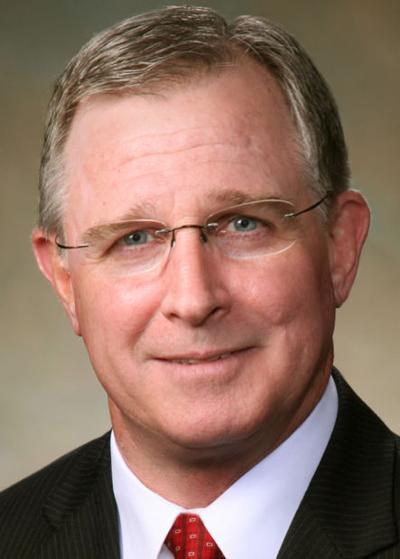 Larry McGowan earns professional designation