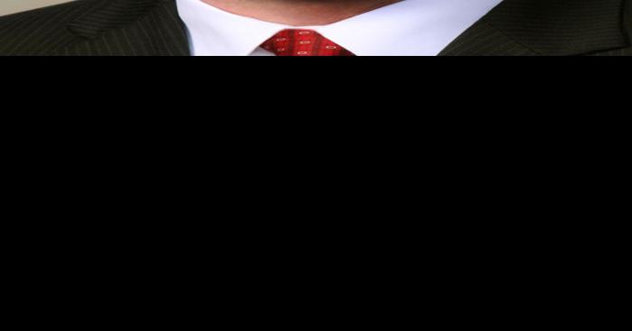 Larry McGowan earns professional designation