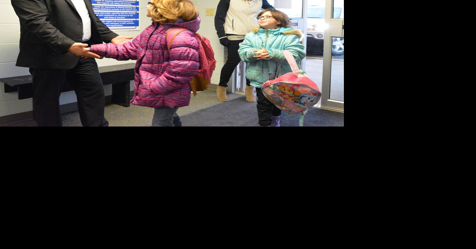 School greeters get students looking at future