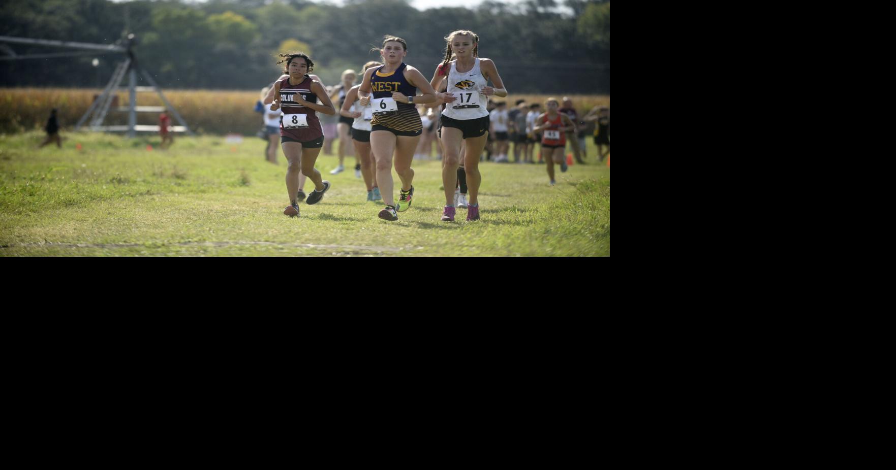 Columbus cross country medals six in home meet