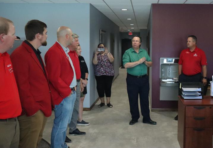 Cruise moves: Cruise & Associates celebrate move to new facilities
