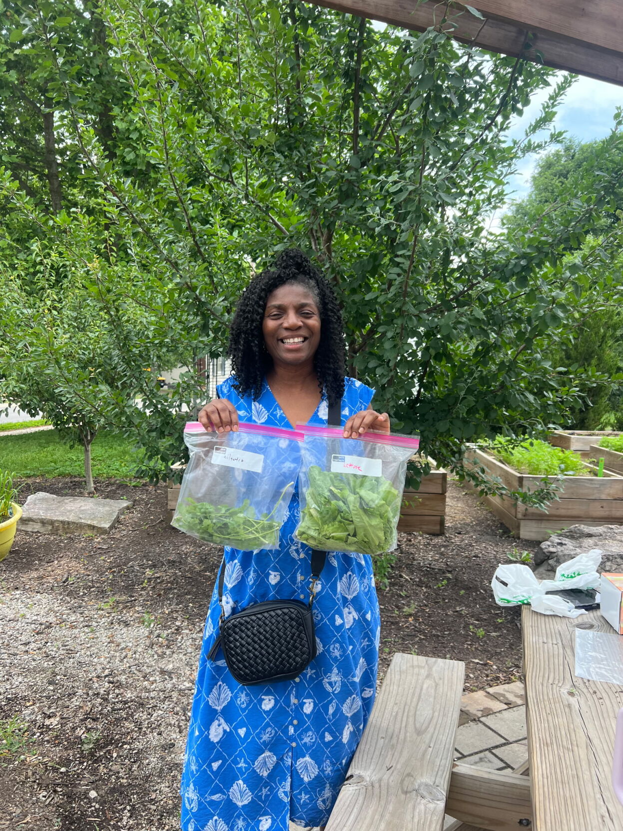 Students, volunteers combine to make a community garden a success ...