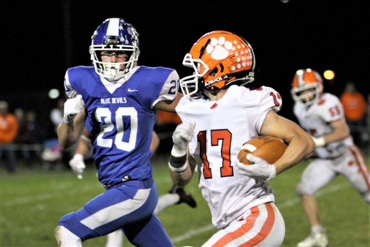 PREP FOOTBALL: Karson Stevenson throws the Blue Devils past the Tigers ...