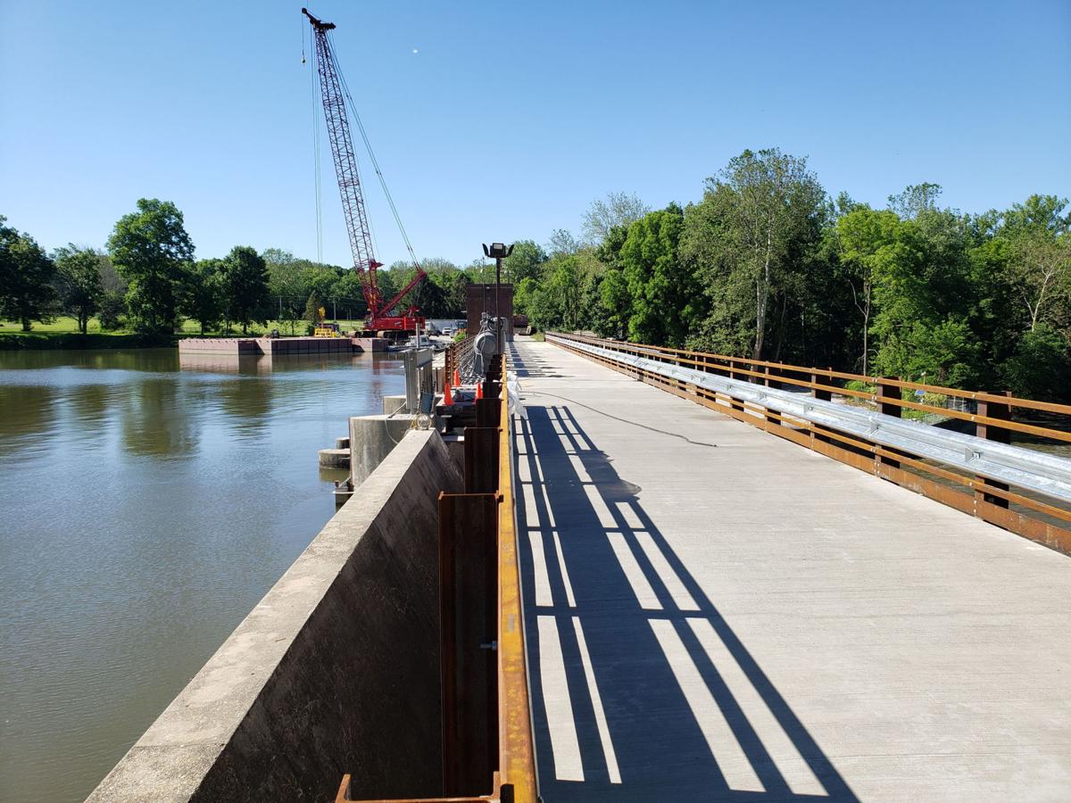 Aqua celebrates completion of dam gates project | Local News ...