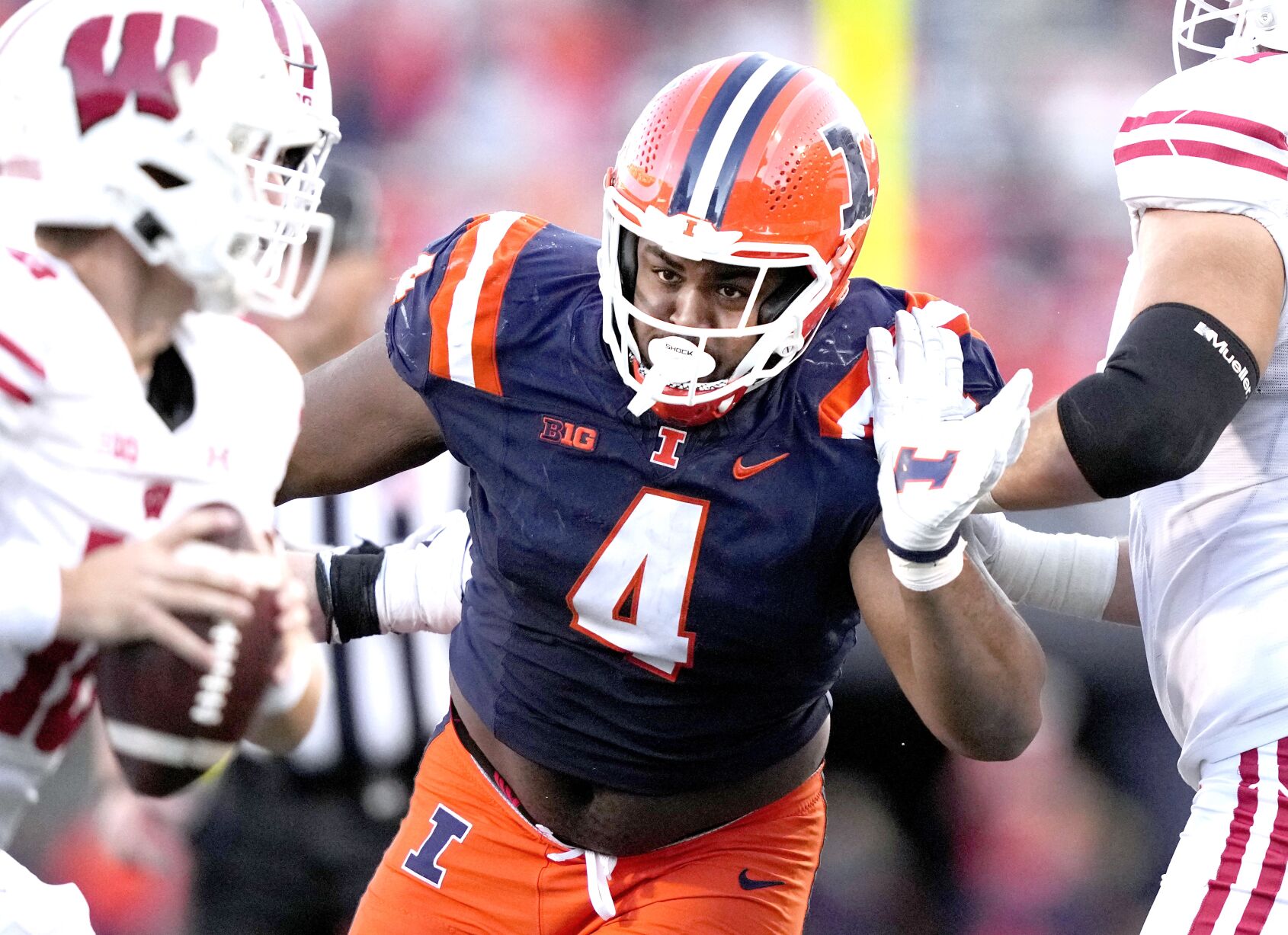 COLLEGE FOOTBALL: Johnny Newton earns Big Ten's top honor on defense ...