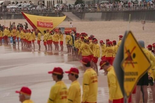 Australian lifeguards fall silent for Bondi Beach victims | Nation ...