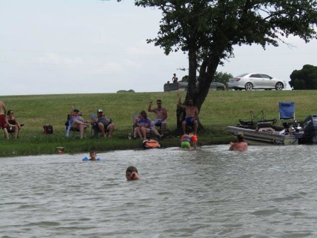 PHOTOS: Summer is in full swing at the Lake Halbert swimming area ...