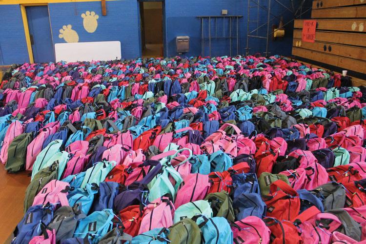 Sharing the Love: Backpacks of Love gives school supplies to kids in ...