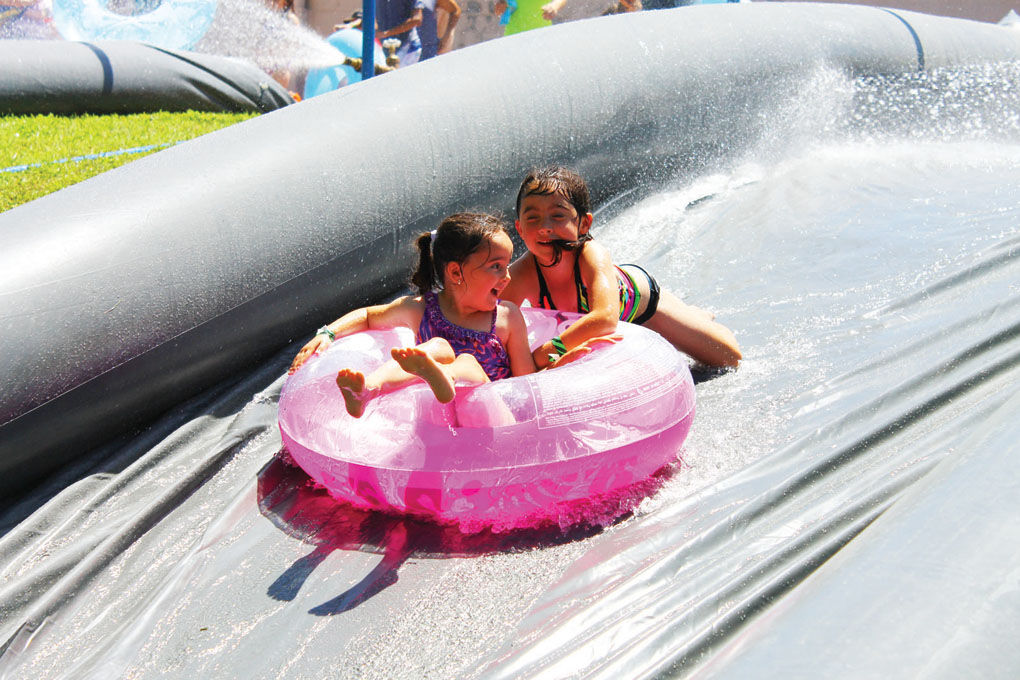 Big Time Rush — Kids beat the heat with Derrick Days water slide | News ...