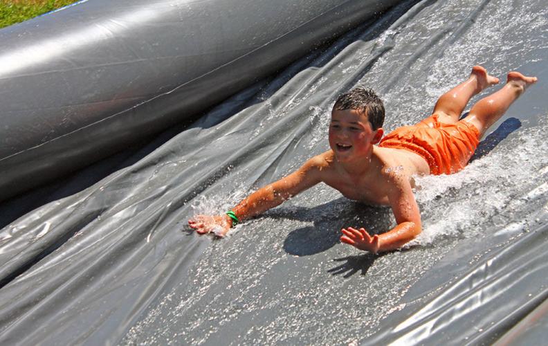 Big Time Rush — Kids beat the heat with Derrick Days water slide | News ...
