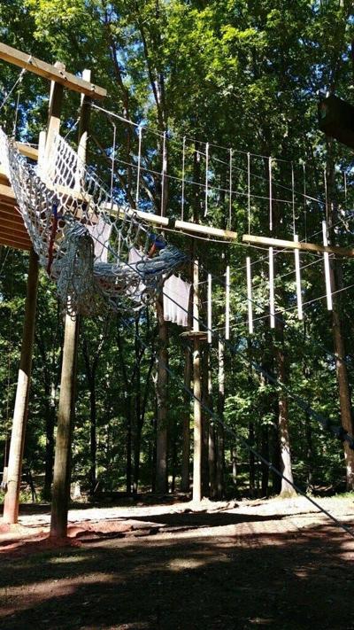 Girl Scouts unveil new high ropes course at camp in Sophia; ribbon ...