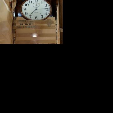 Master clock that once controlled mill clocks returns to former Acme ...