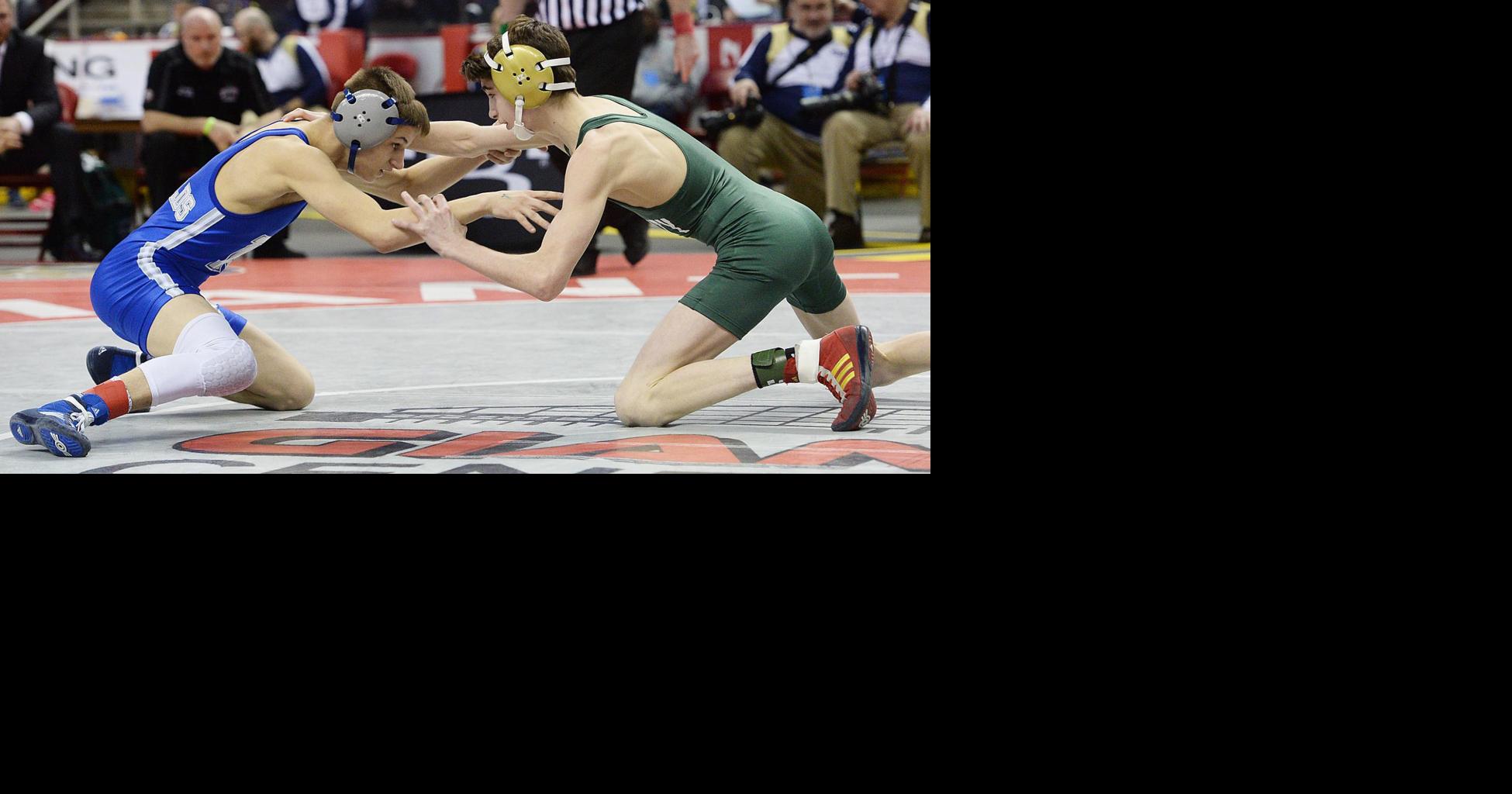 Reunited: Trinity wrestling head coach Joe Perretta, Patrick DeMark ...