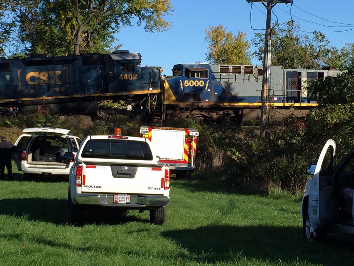 Freight train hits another head-on, injuring 2 workers