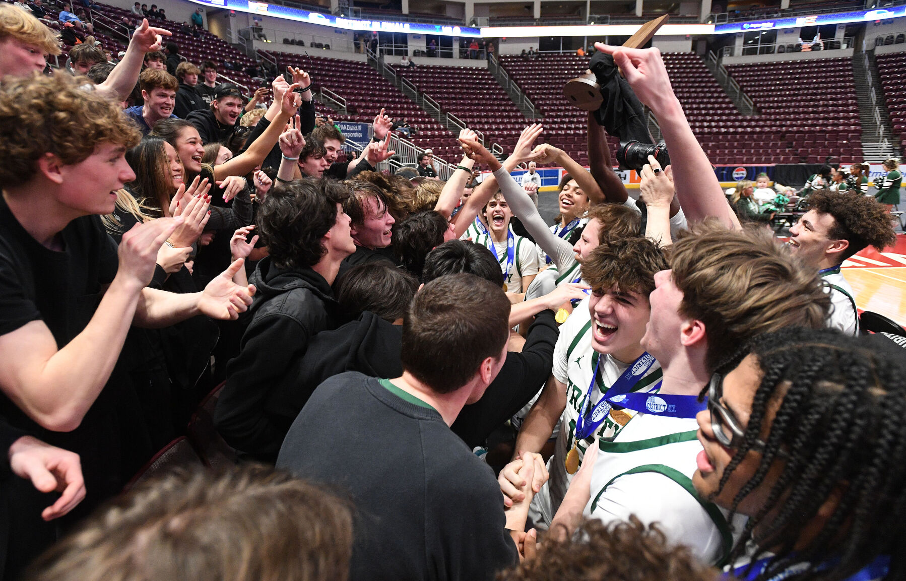 Trinity boys basketball hoists 20th District 3 title