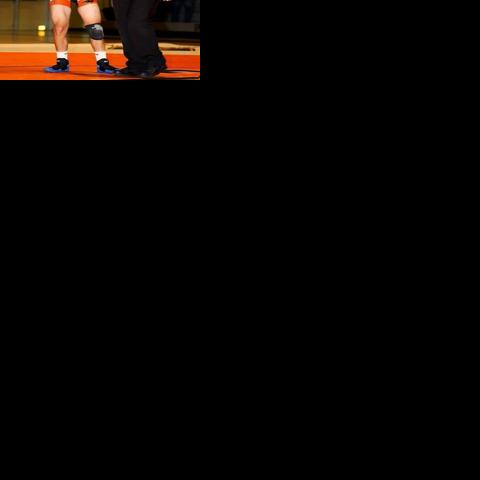 East Pennsboro's Matthew Danner looks up to wrestling neighbor