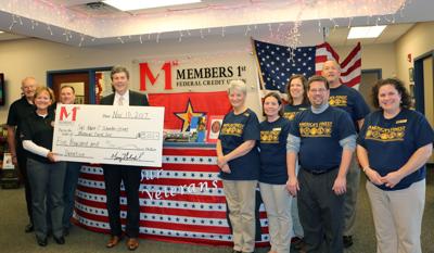 Members 1st donates $5,000 to memorial fund