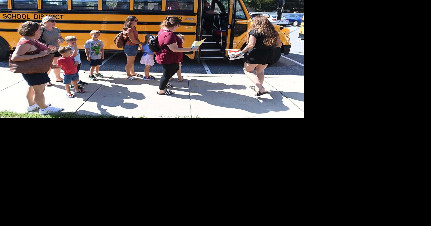 Kindergarten students experience their first school bus ride