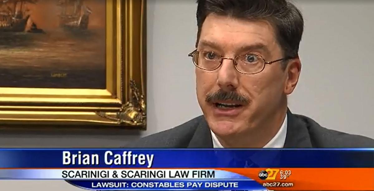 Constable sues Harrisburg district justice