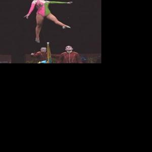Acrobat performs hair-raising act