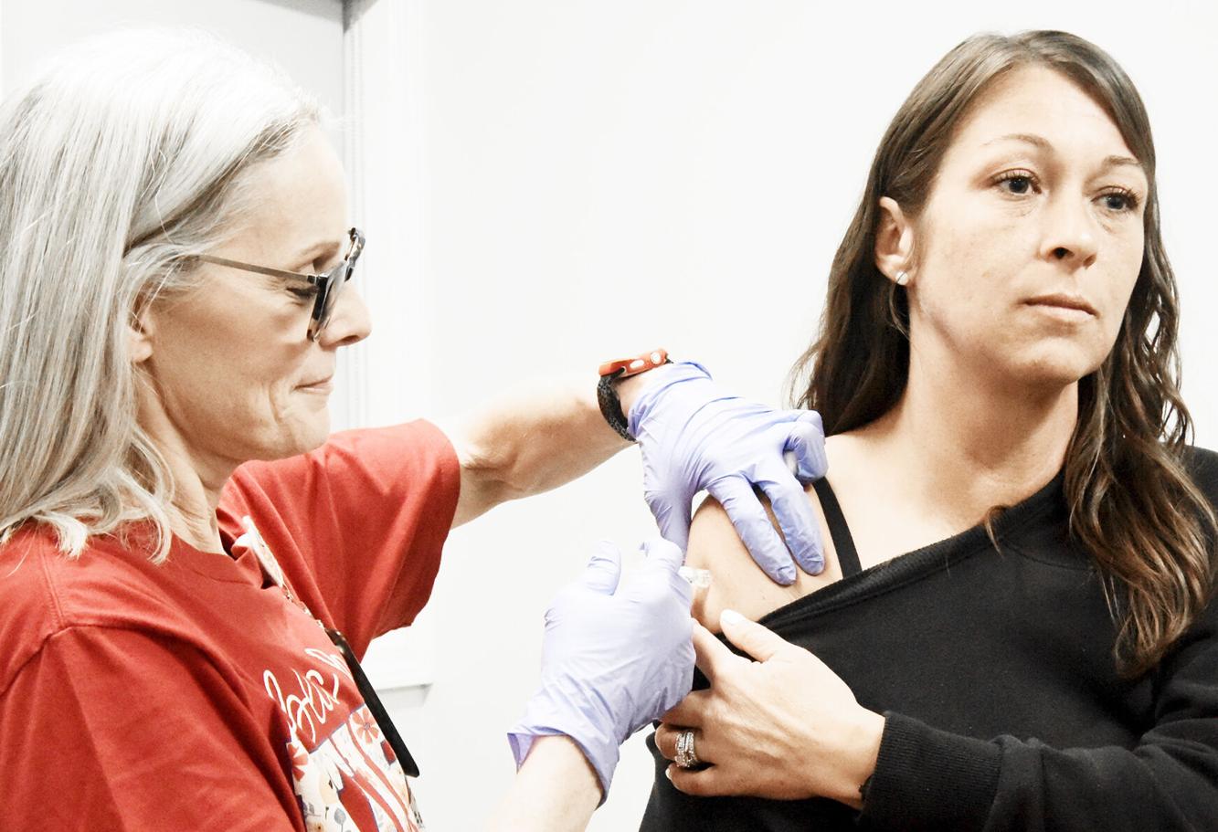 Health officials emphasize importance of flu vaccine as cases surge ...