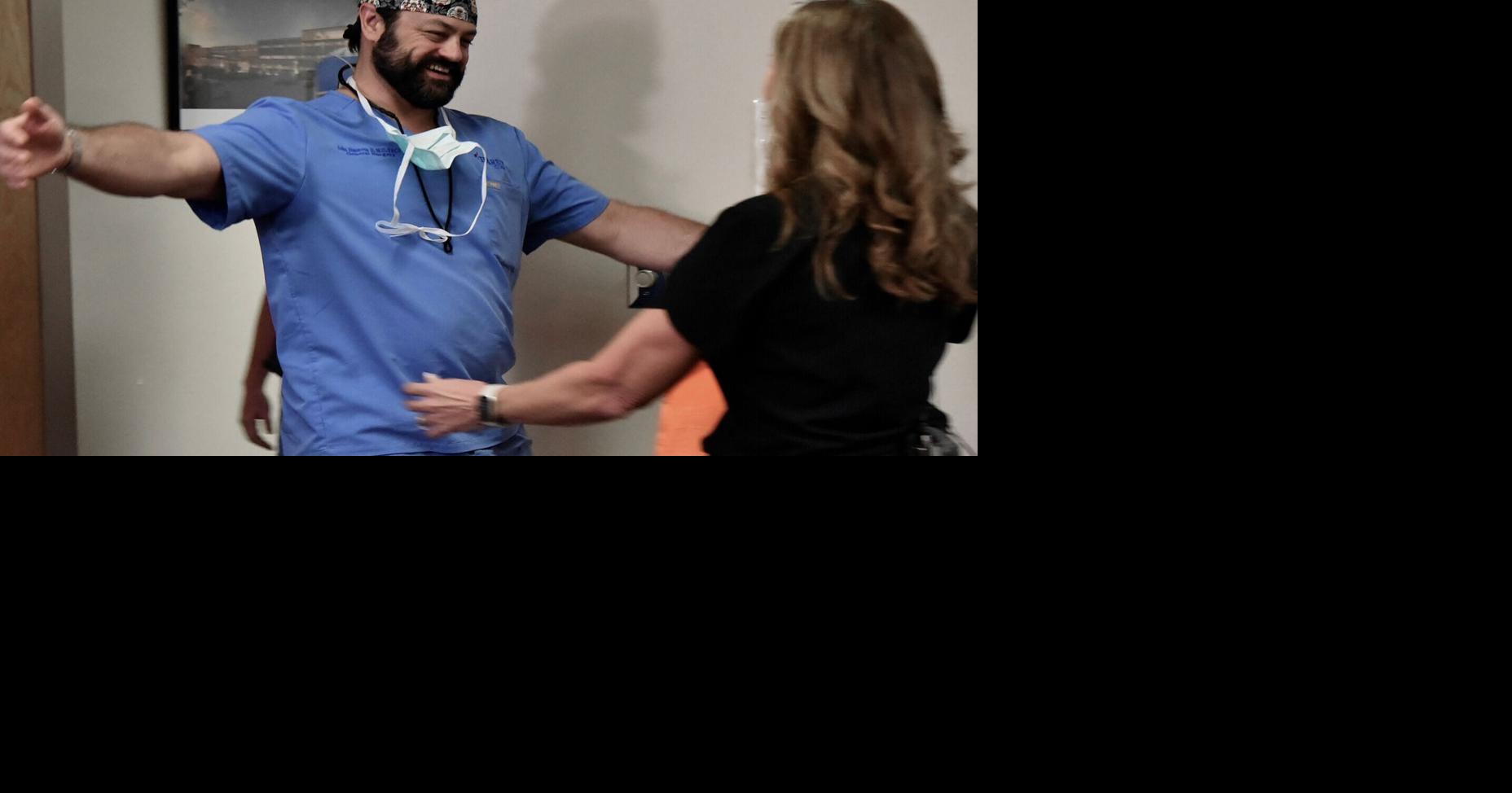 Colon cancer survivor pays tribute to “superhero” physician | News ...