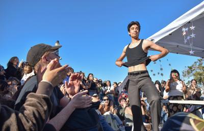 Community gathers, onlookers swoon at Dev Patel look-alike contest ...