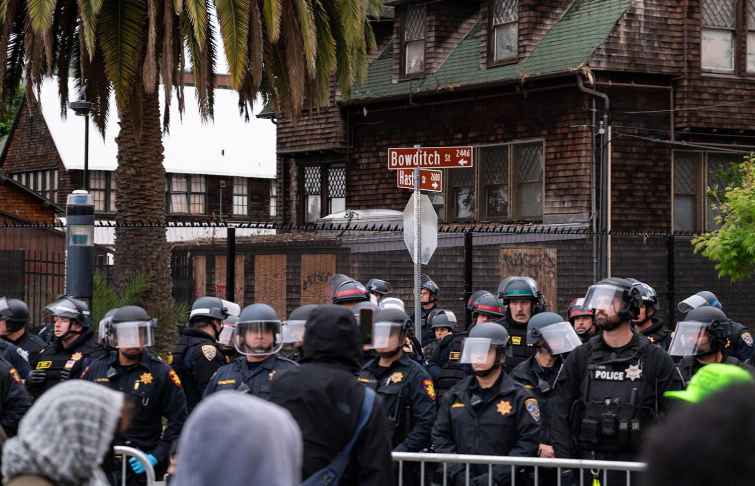 Law enforcement barricade Anna Head Hall, call for dispersal ...