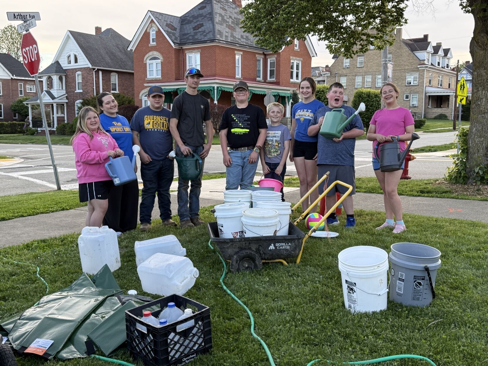 Volunteers water newly planted trees at Scottdale park | News ...