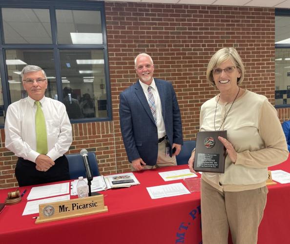 Mt. Pleasant swim team, coach recognized | Multimedia | dailycourier.com