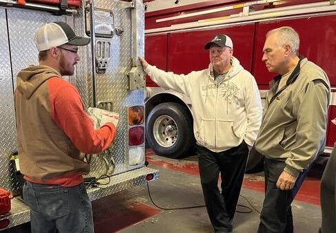 Firefighters donate AED to trail council | Multimedia | dailycourier.com