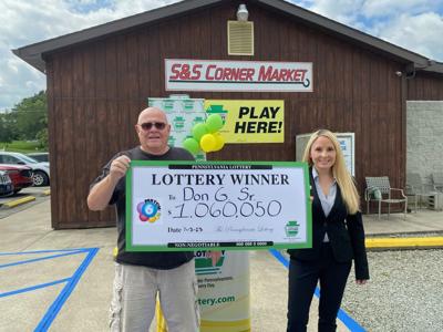 Pa. Lottery presents commemorative check to lottery winner | News ...
