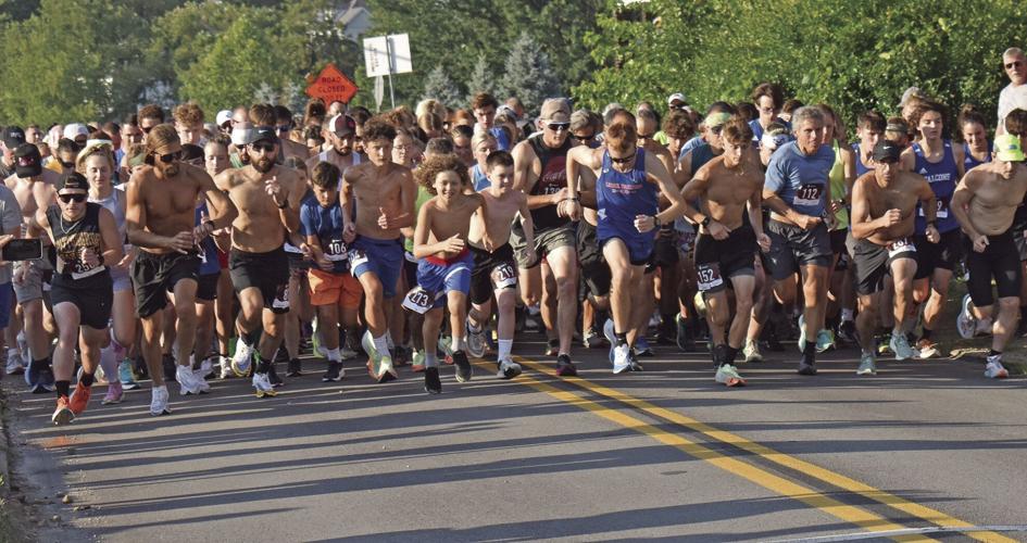 Woodruff Race draws hundreds, honors McPoyle | Sports | dailycourier.com