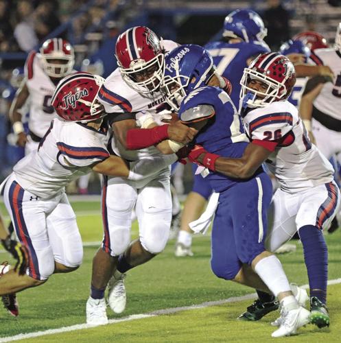 Tigers race past Falcons, 48-6 | Sports | dailycourier.com