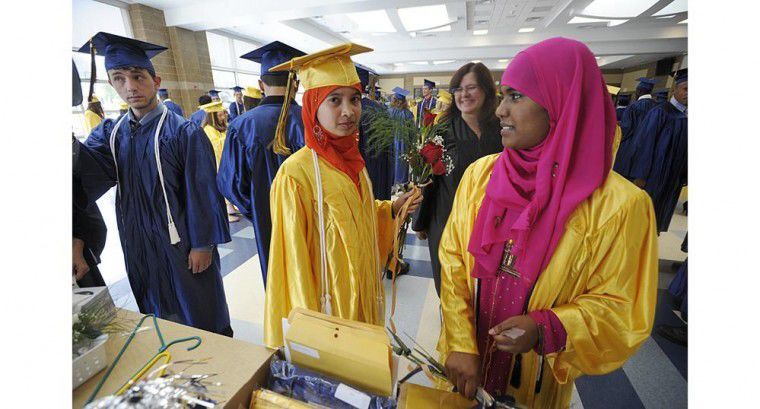 Hudson High exhibits 'Bluehawk pride' on graduation day ...