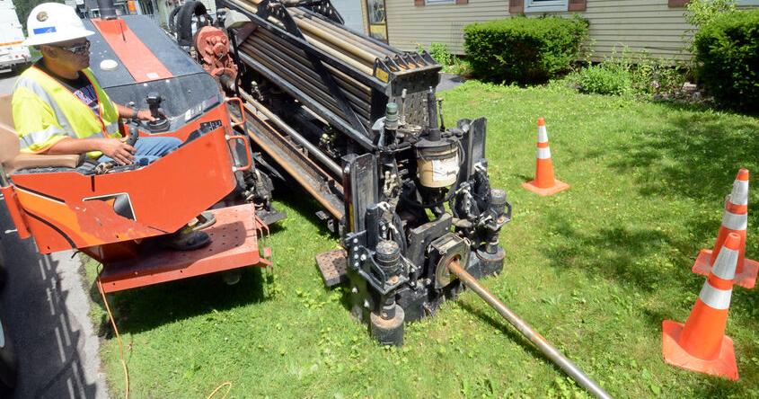 National Grid snakes new gas lines below streets, lawns | News ...