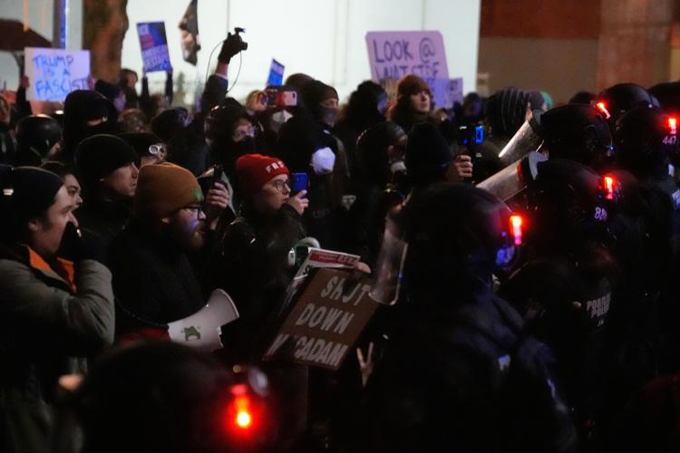 Photos show protests over the shooting of 2 people by federal ...