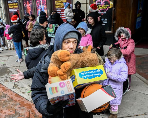 Random Santa Drop Off stops at Proctors Theatre in 7 photos | Photo ...