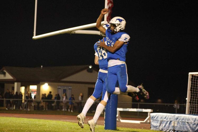 H.S. FOOTBALL: Evans rushes for 366 yards, five TDs in ICC victory ...