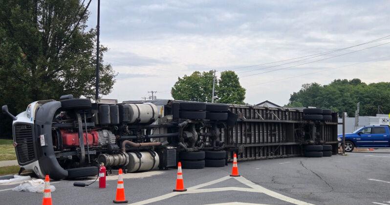 Tractor trailer rolls over in Malta roundabout | News | dailygazette.com
