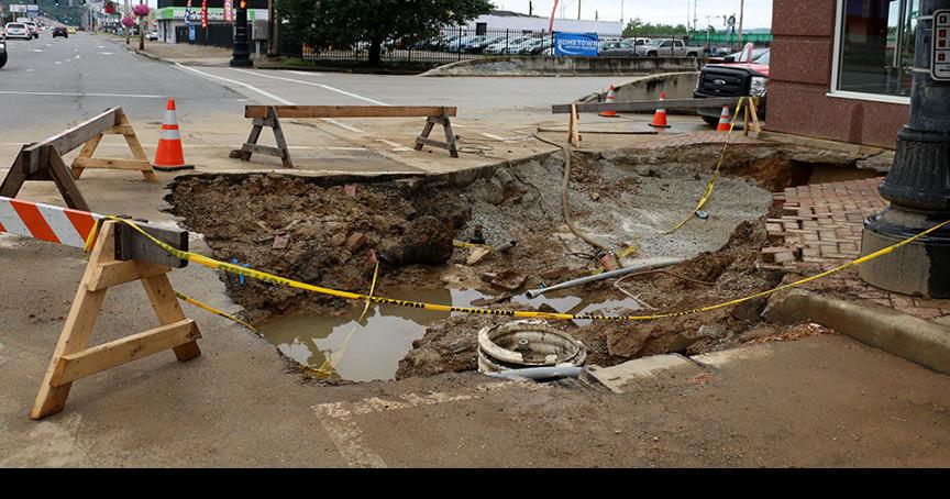 Water woes: Underground leak floods local business, backs up traffic ...